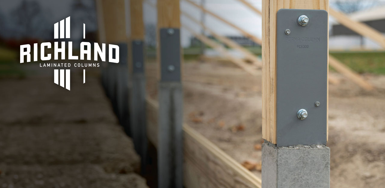 Precast concrete columns elevate wood columns out of the ground ...